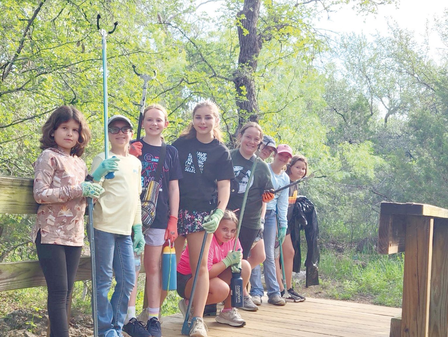 Girl Scouts clean flood-damaged areas